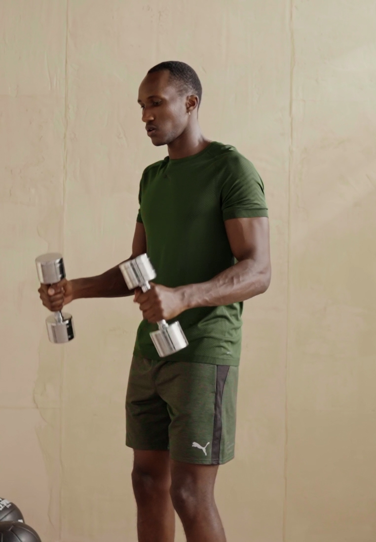 Puma TRAIN SEAMLESS TEE - Sport T-shirt - myrtle/grün - Zalando.ch